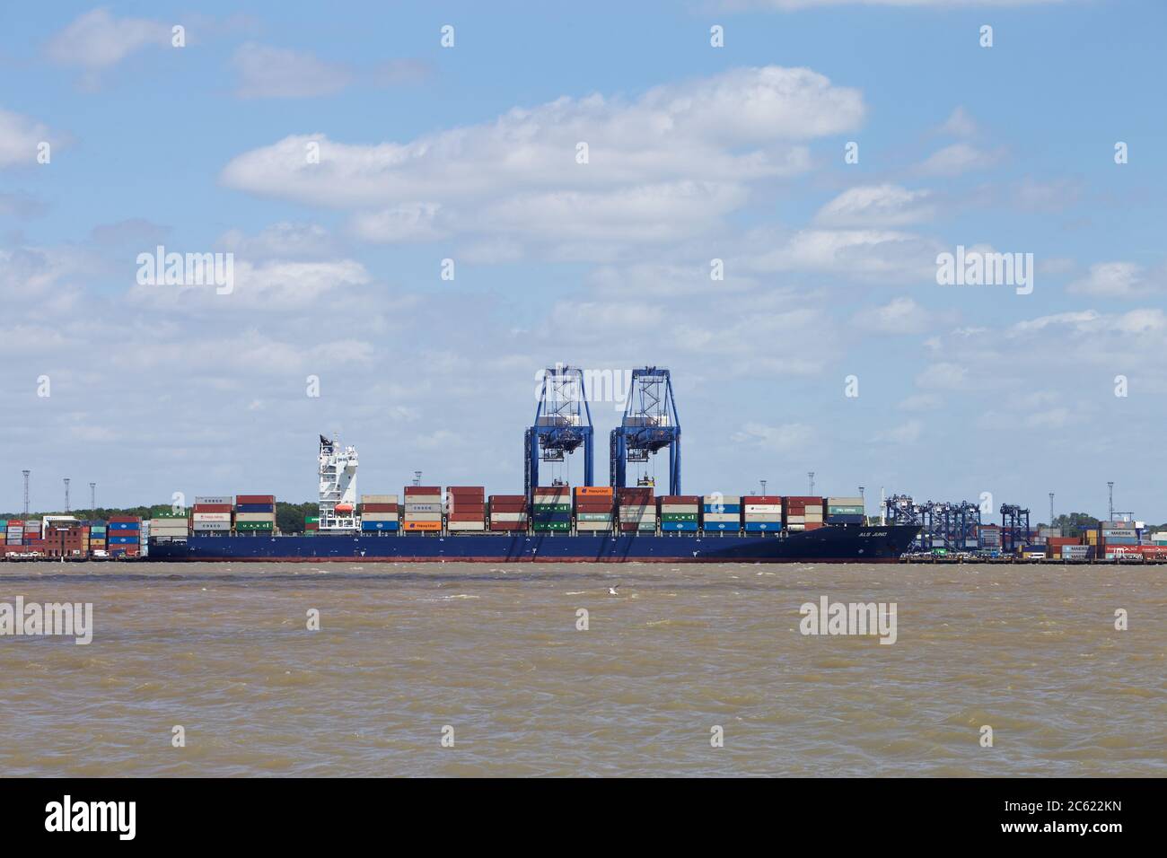 Container ship ALS Juno docked at the Port of Felixstowe, Suffolk, UK ...