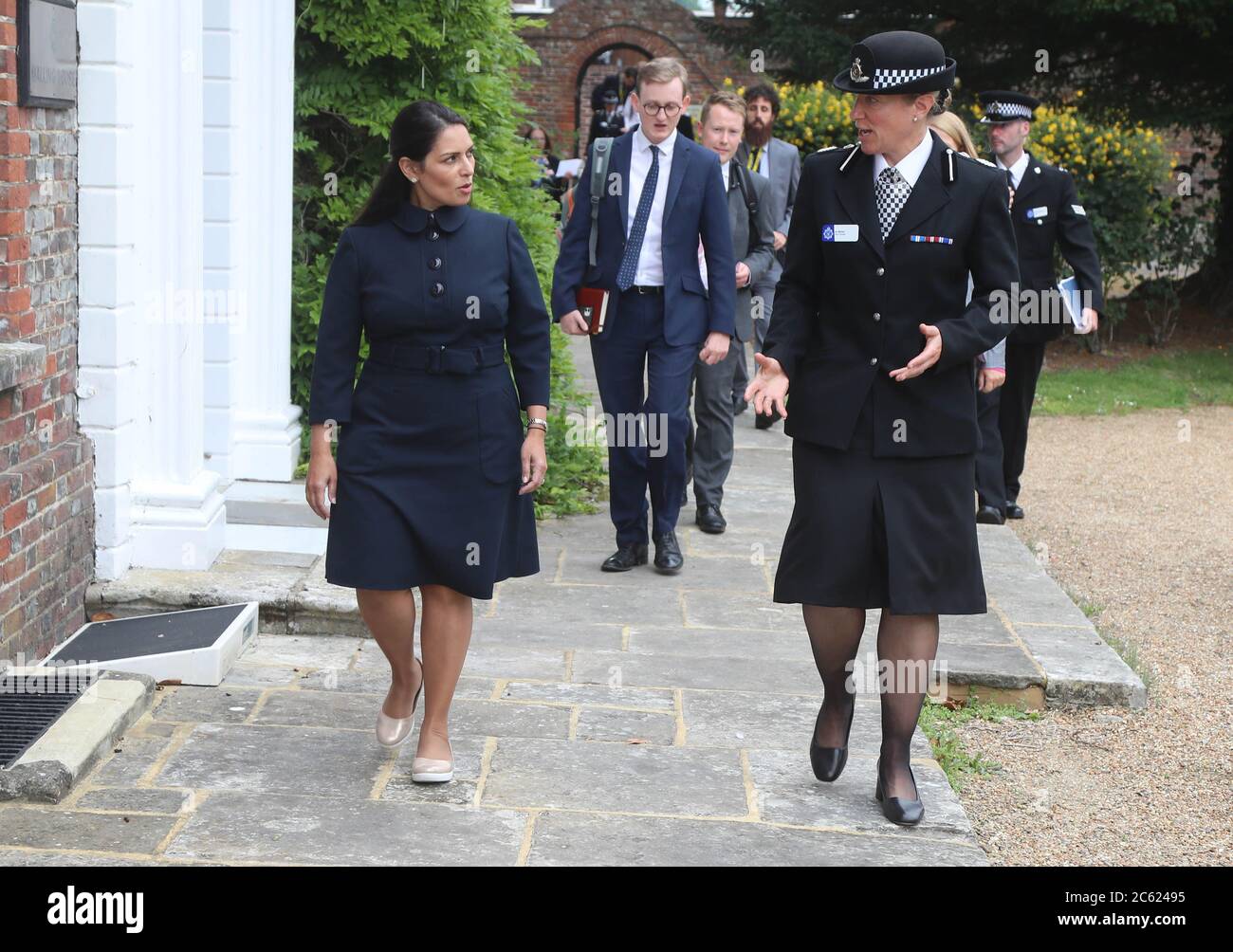 Home Secretary Priti Patel (left) with Chief Constable of Sussex Police ...