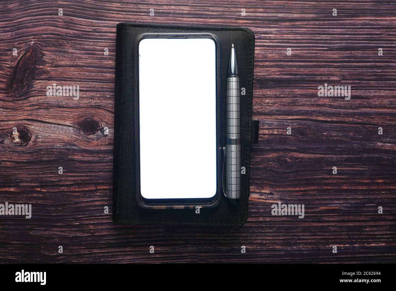 smart phone with empty screen on notepad Stock Photo - Alamy
