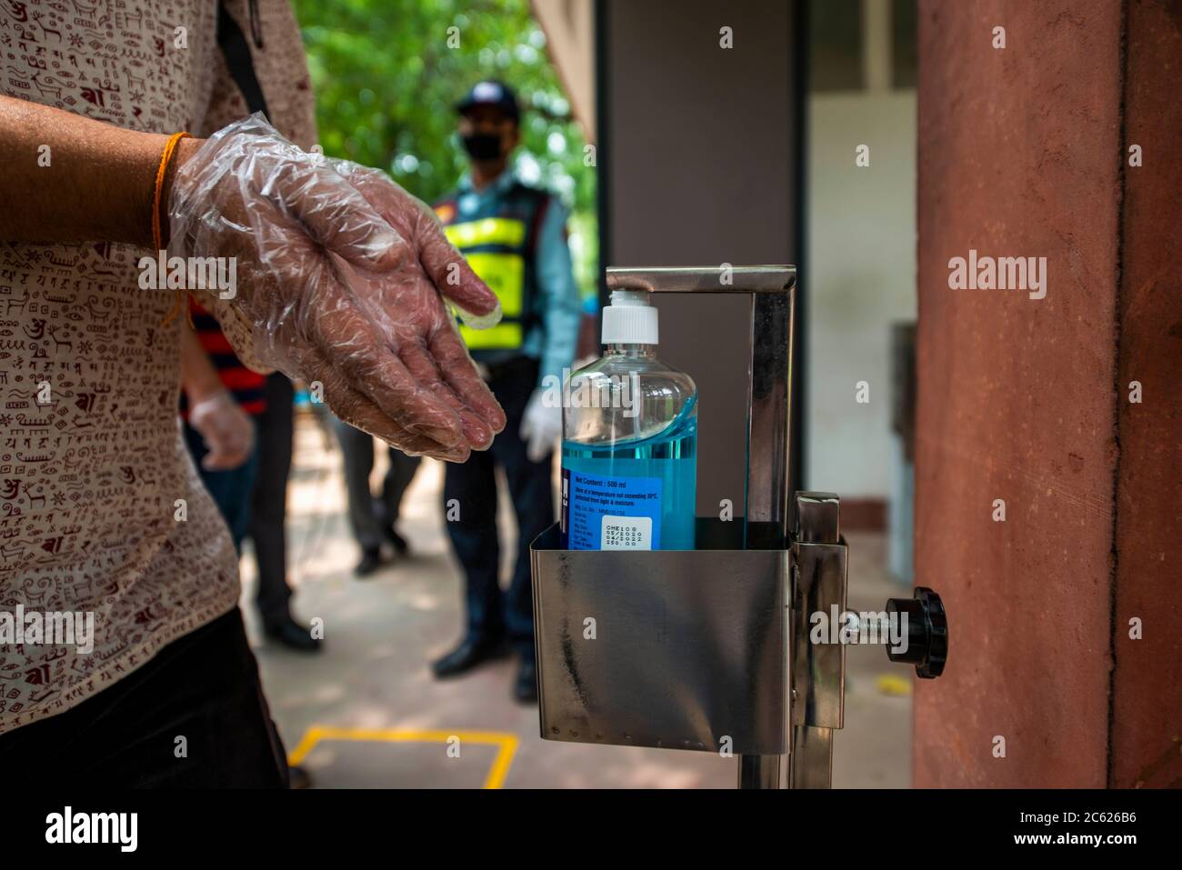 Sanitizing of visitors hi-res stock photography and images - Alamy