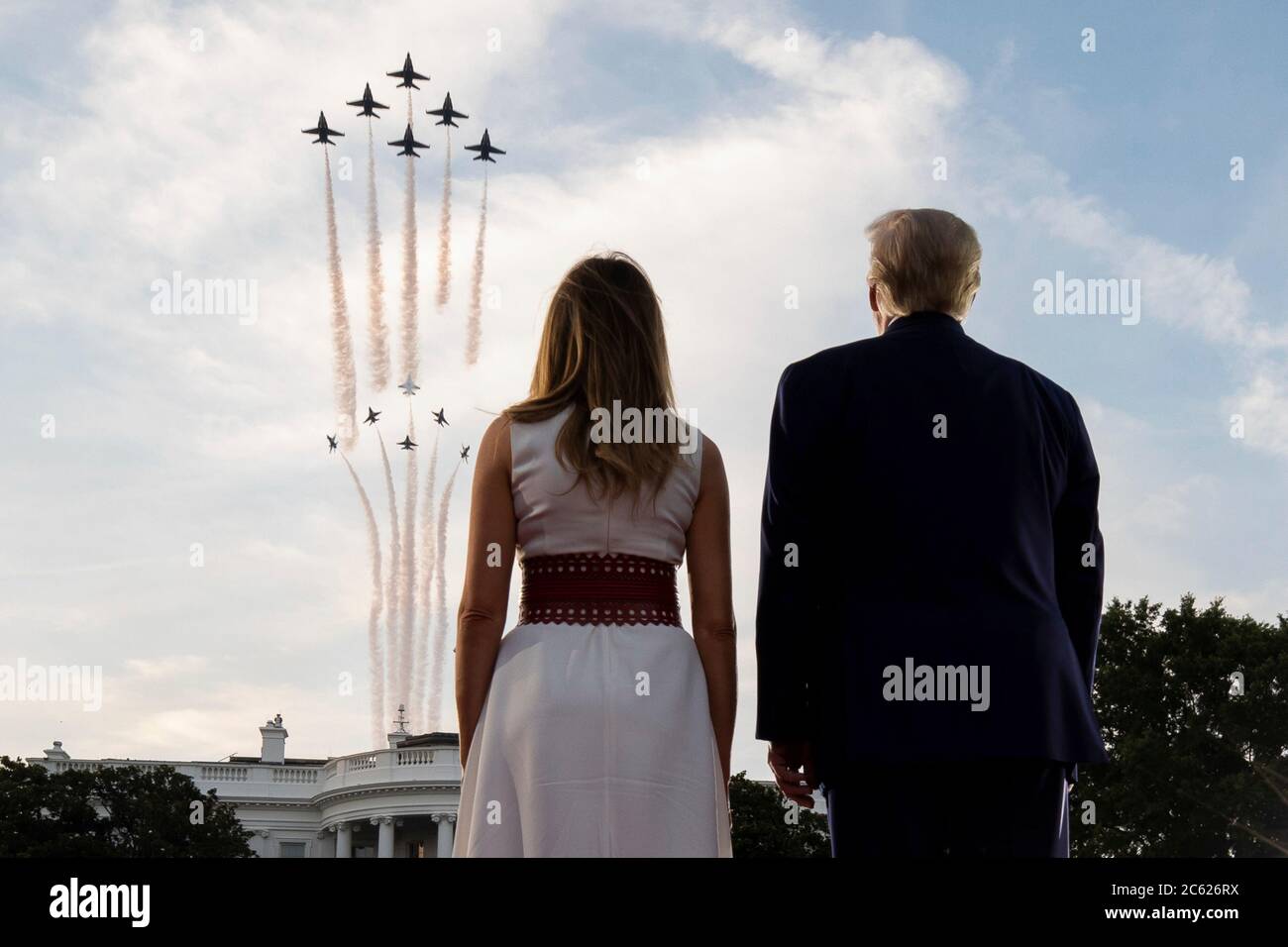 U.S. President Donald Trump and First Lady Melania Trump watch a fly ...