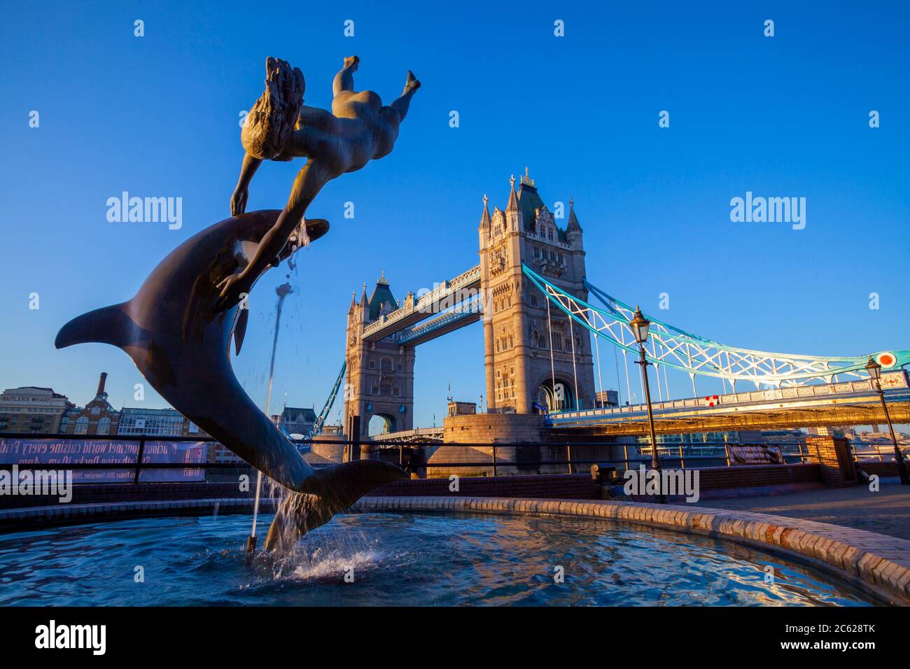 Girl with a Dolphin and Tower Bridge, London, England Stock Photo - Alamy