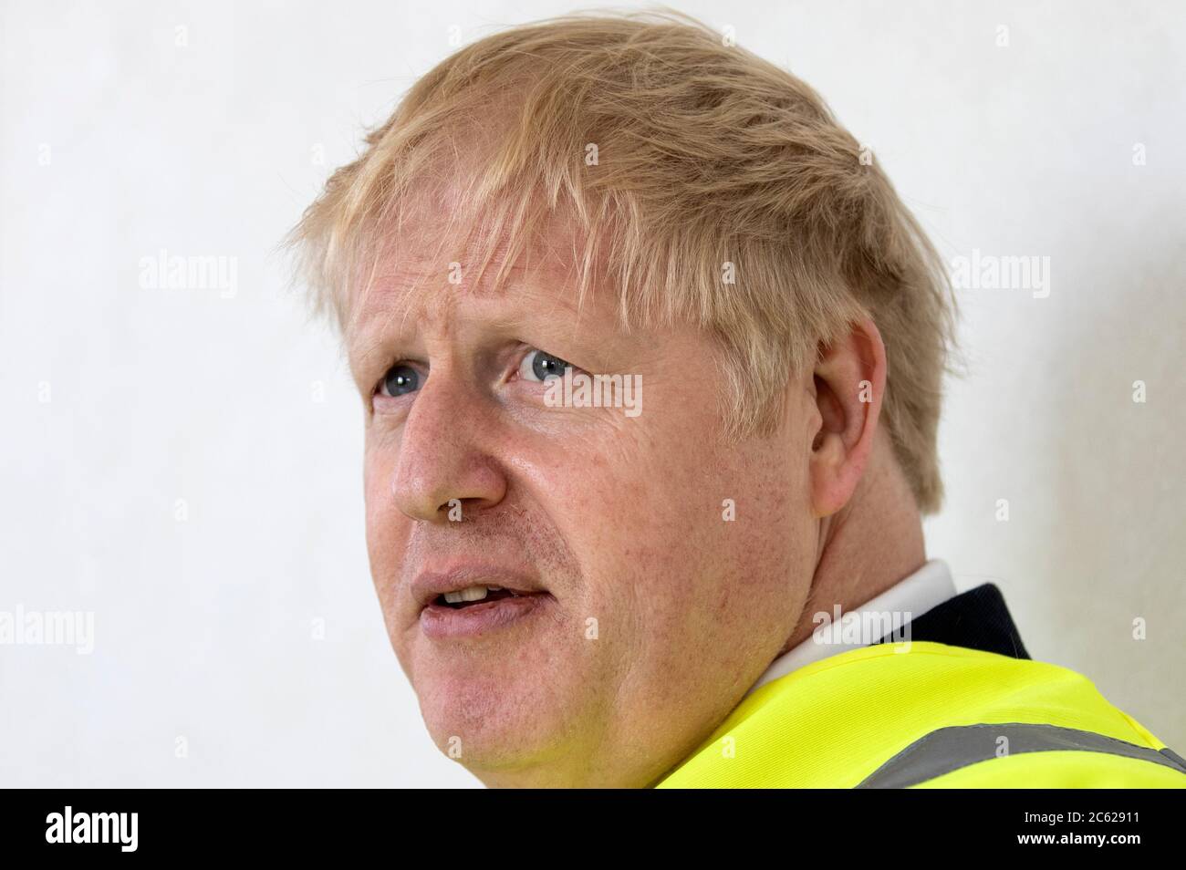 Prime Minister Boris Johnson, sporting a new haircut, during a visit to ...
