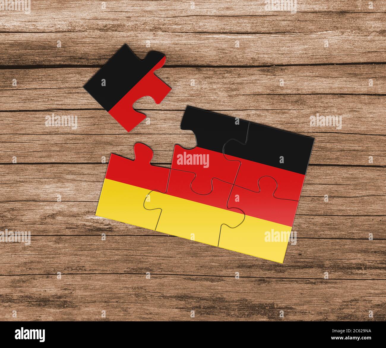 Germany national flag on jigsaw puzzle. One piece is missing. Danger ...