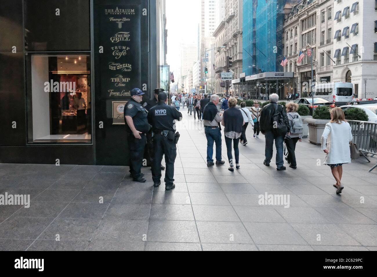 trance to the Trump Tower in Manhattan, showing NYPD security officers ...