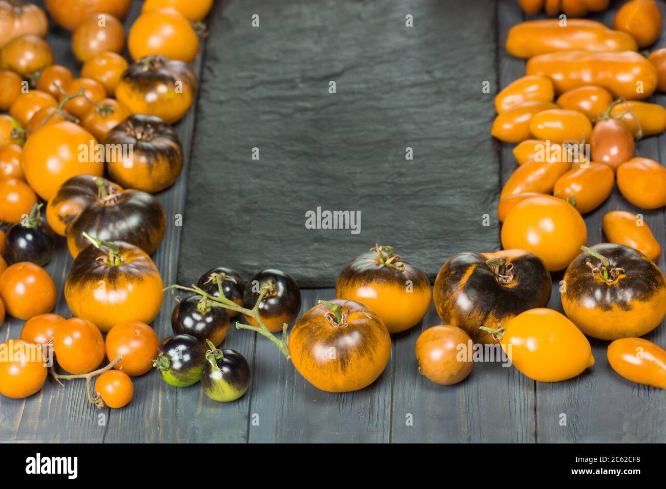 Variety fresh colorful tomatoes. Organic farming is eco friendly. Group ...