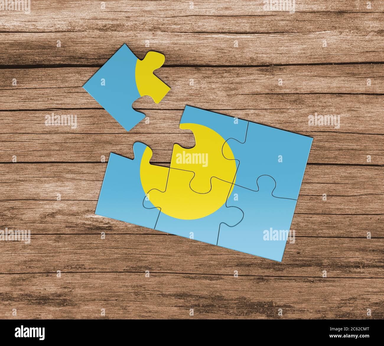 Palau national flag on jigsaw puzzle. One piece is missing. Danger ...
