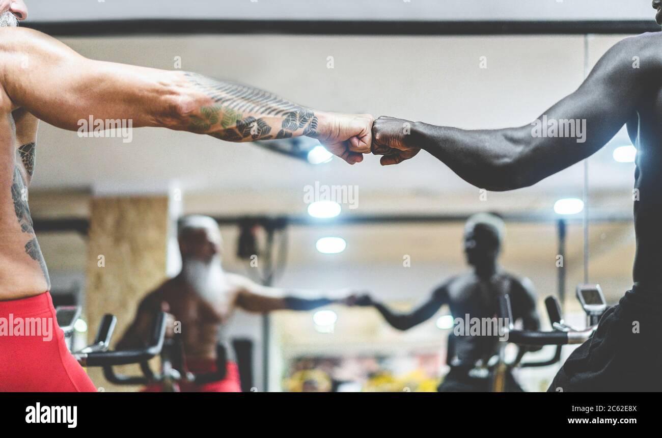 People from different generation and ethnicities doing workout session ...