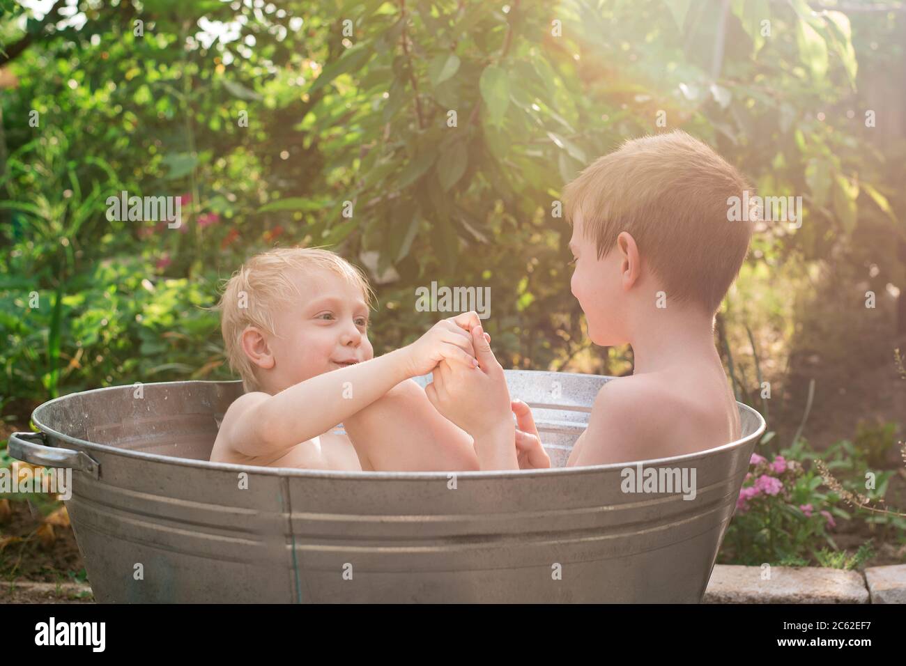 Brothers bathing hi-res stock photography and images - Alamy