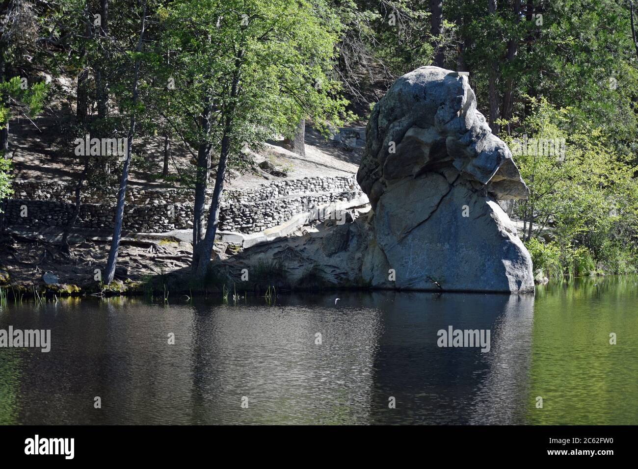 Large Boulder in a Lake Stock Photo - Alamy