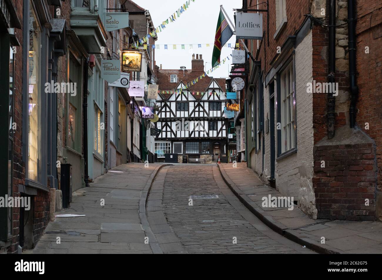 The view up Steep Hill in Lincoln towards the market square and ...