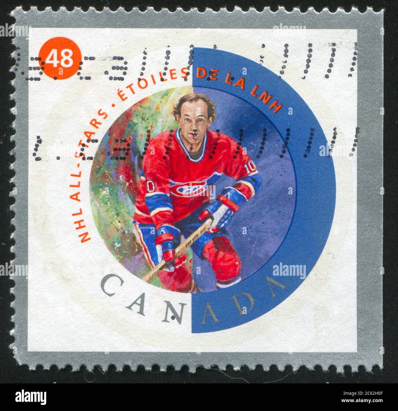 CANADA - CIRCA 2002: stamp printed by Canada, shows hockey player ...