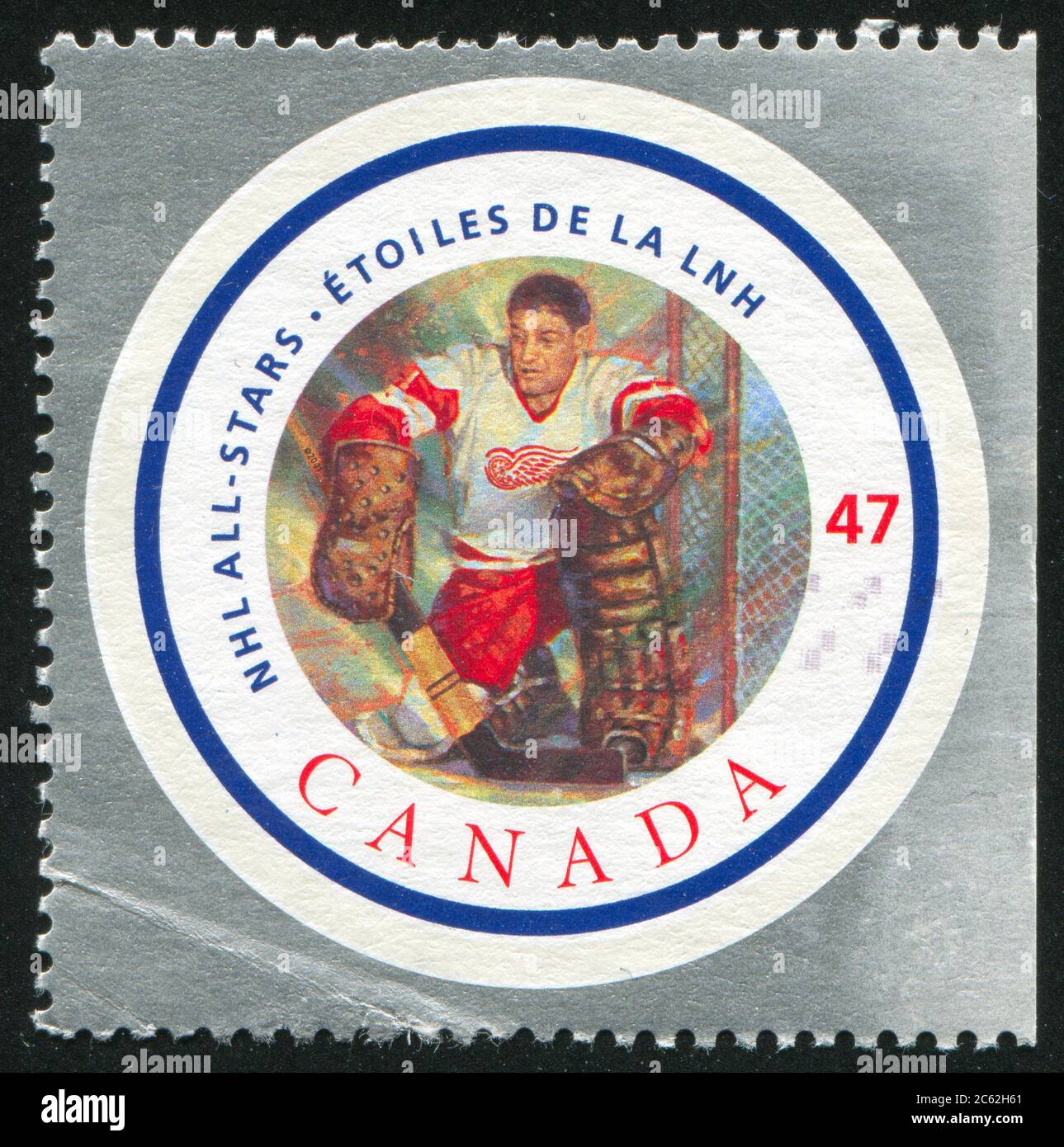 CANADA - CIRCA 2001: stamp printed by Canada, shows hockey player ...