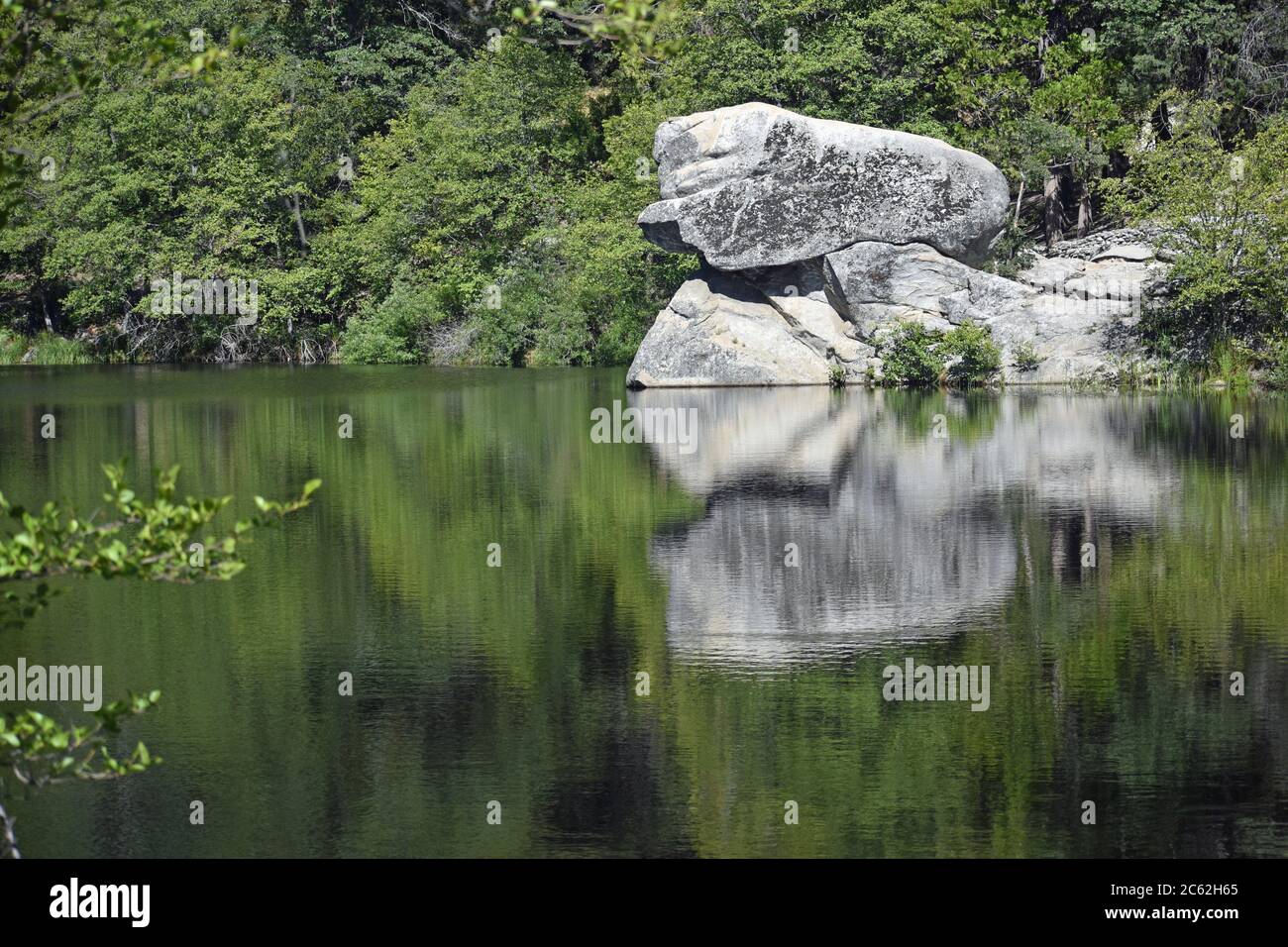 Large Boulder in a Lake Stock Photo - Alamy