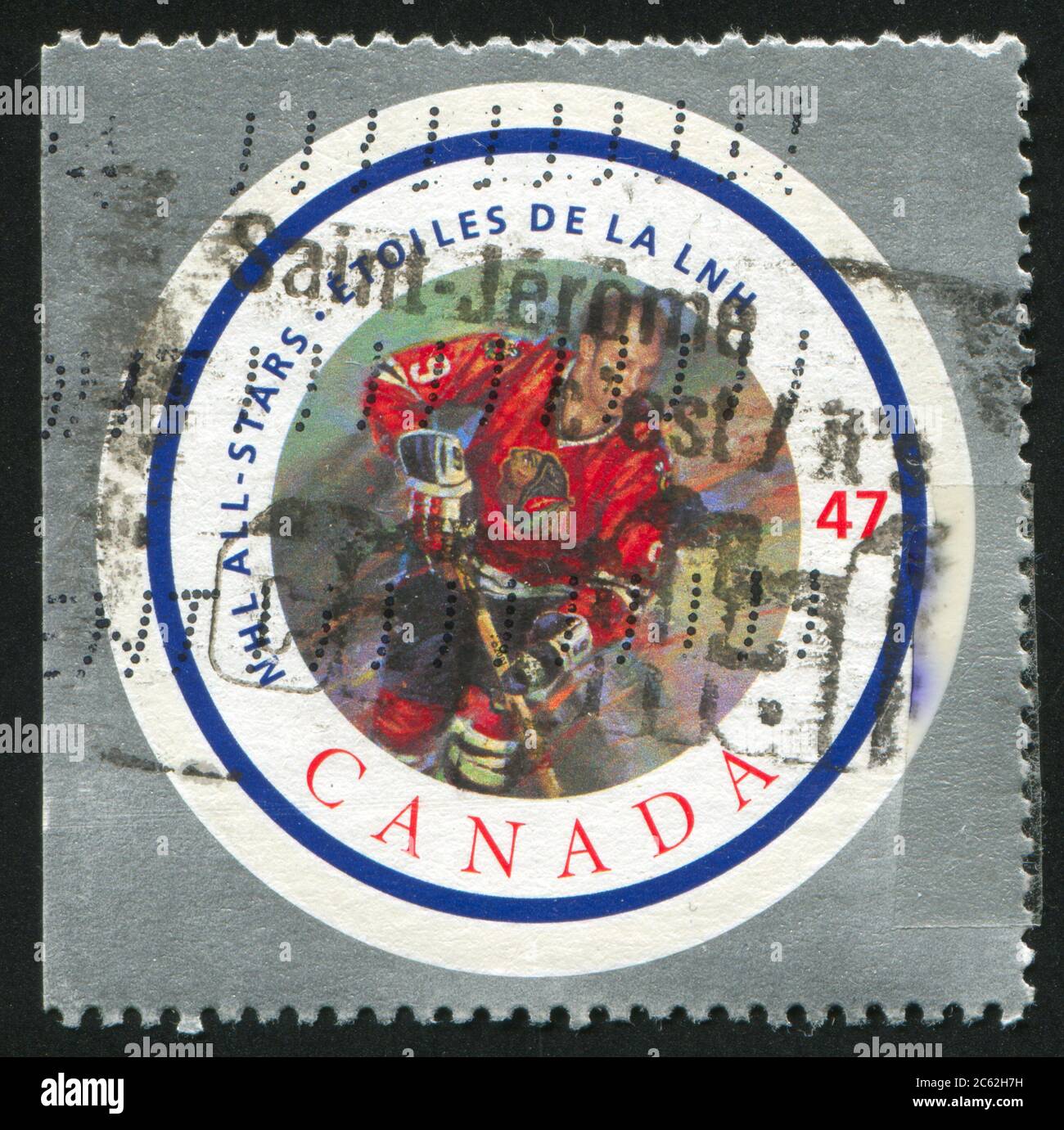 CANADA - CIRCA 2001: stamp printed by Canada, shows hockey player ...