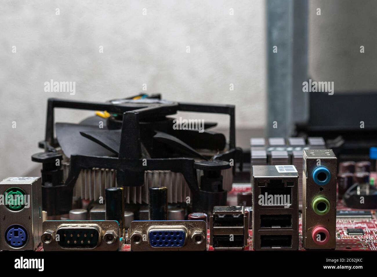Side view of the motherboard with PCU cooler and ports. USB, VGA, DVI ...