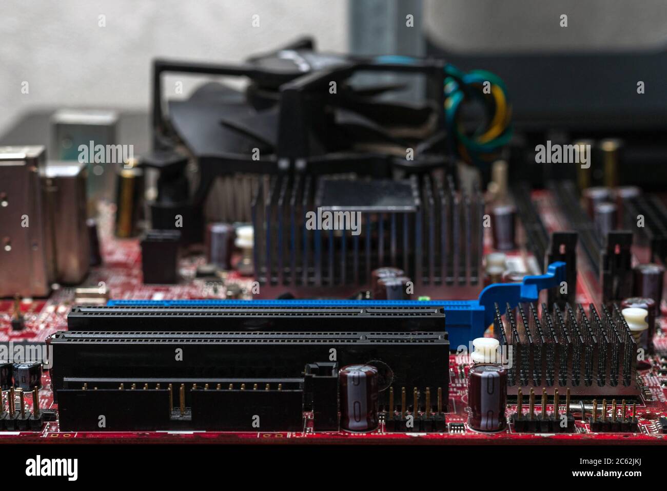 Motherboard with cooling fan. Side view, close-up, background idea ...