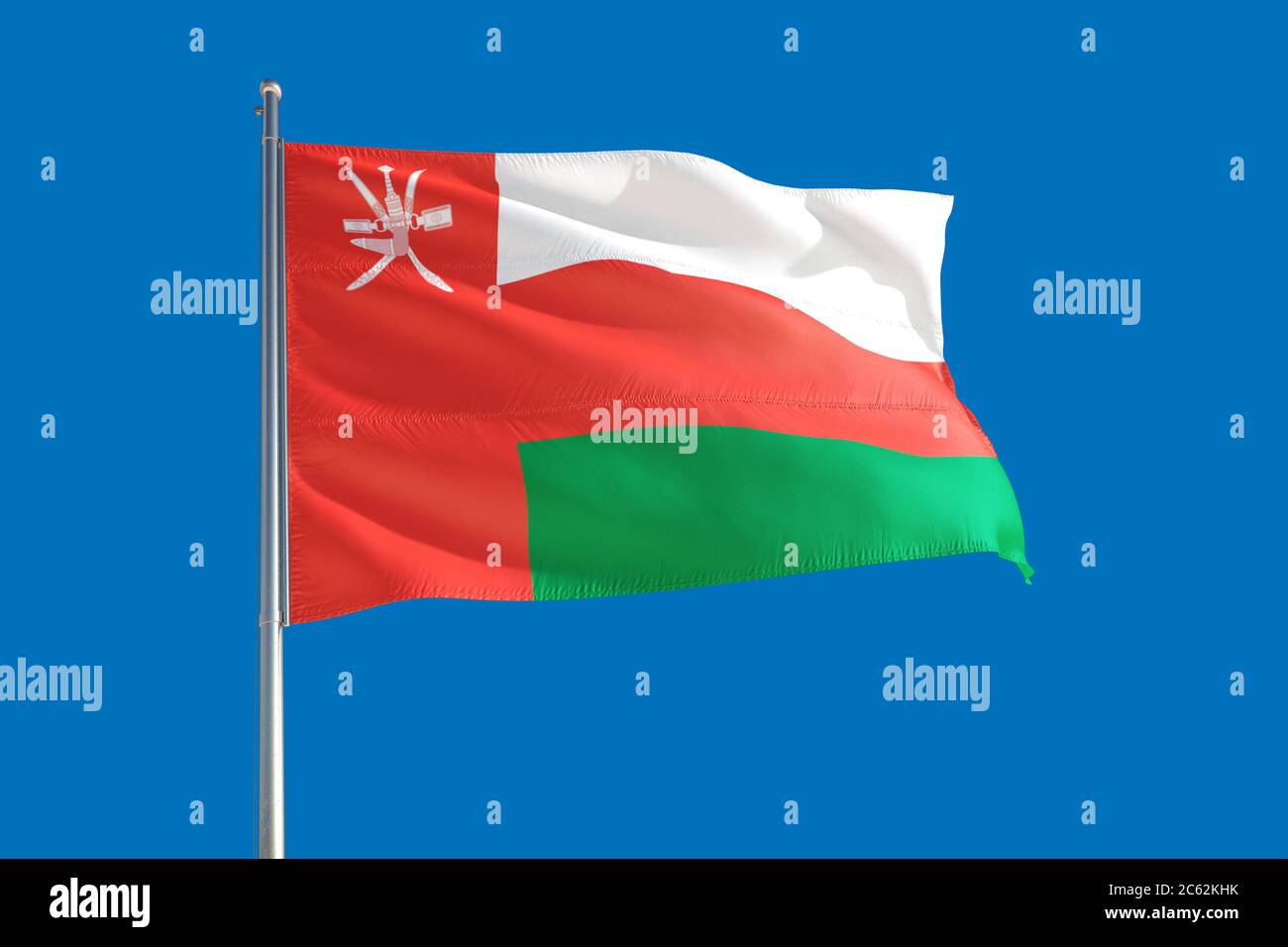 Oman national flag waving in the wind on a deep blue sky. High quality ...
