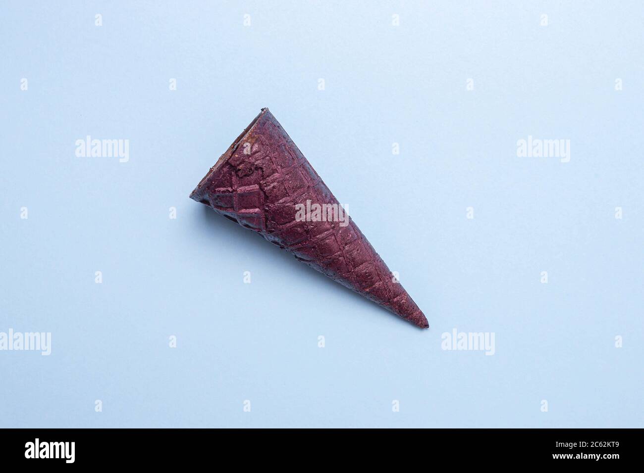 Top view of purple waffle horn filled with cottage cheese in chocolate ...