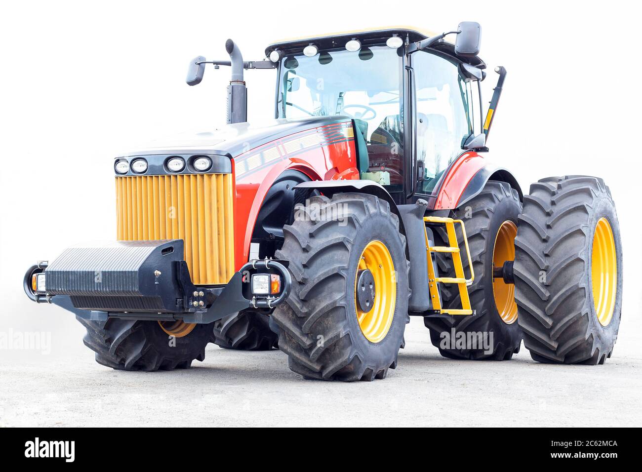 Big tractor on a white background. Agricultural machinery close-up ...
