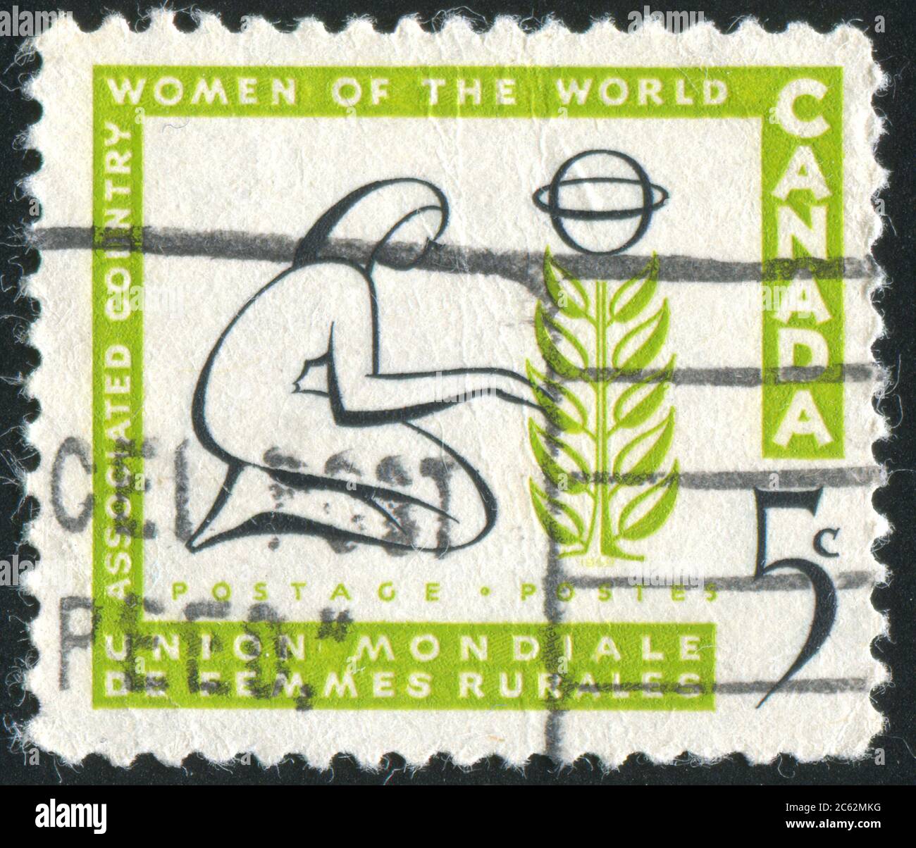 CANADA - CIRCA 1959: stamp printed by Canada, shows Woman Tending Tree ...