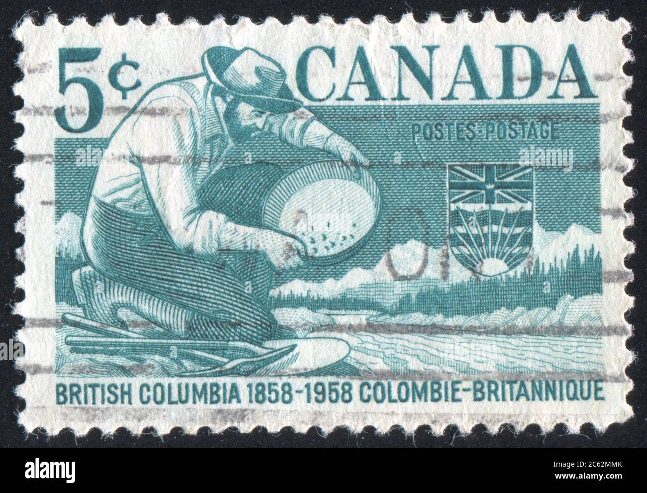 CANADA - CIRCA 1958: stamp printed by Canada, shows Miner Panning Gold ...