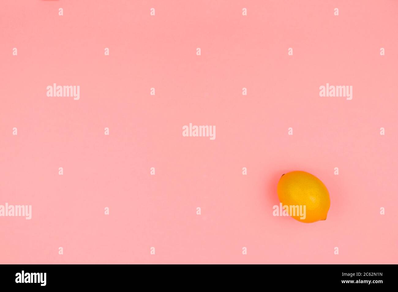 Lemon on a pink background.Still life with citrus Stock Photo - Alamy