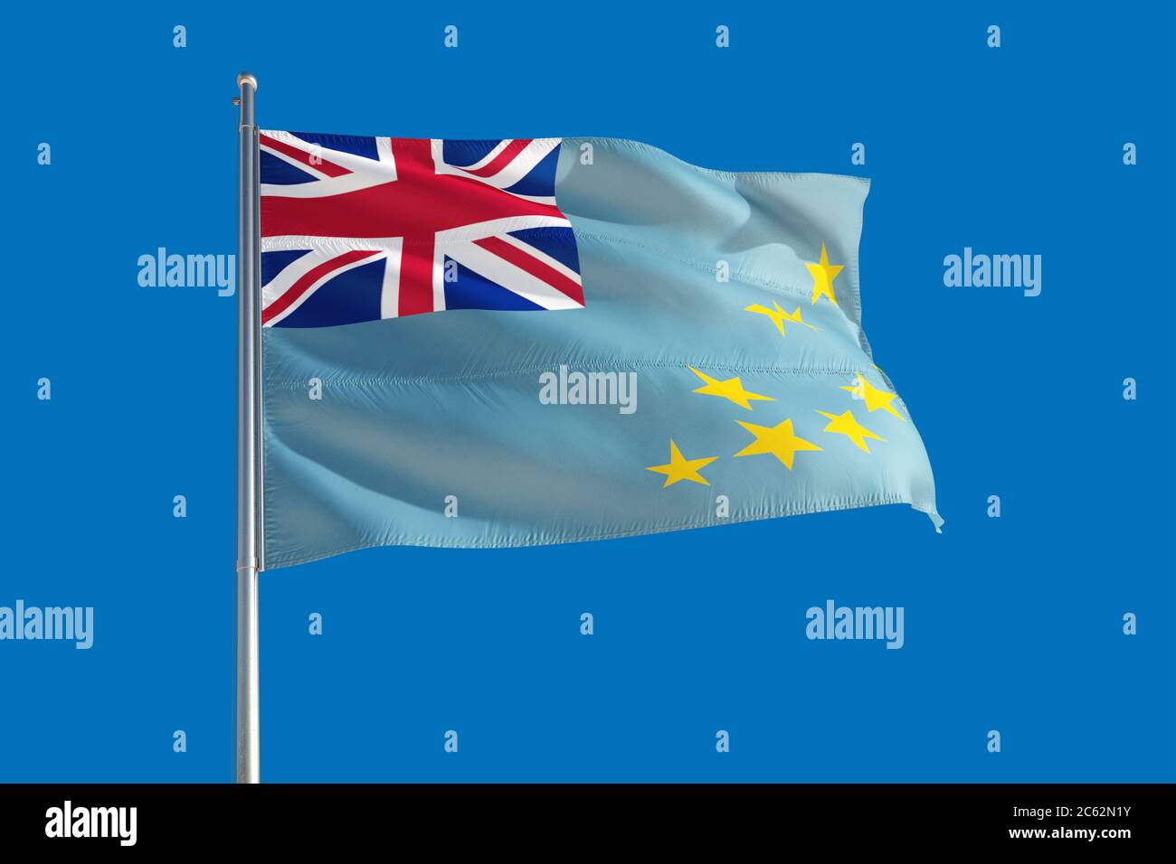 Tuvalu national flag waving in the wind on a deep blue sky. High ...