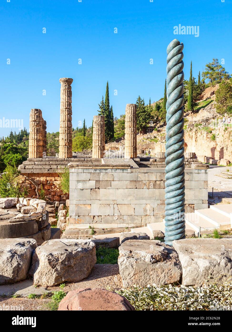 Serpent Column of Plataea and Temple of Apollo in Delphi. Delphi is ...