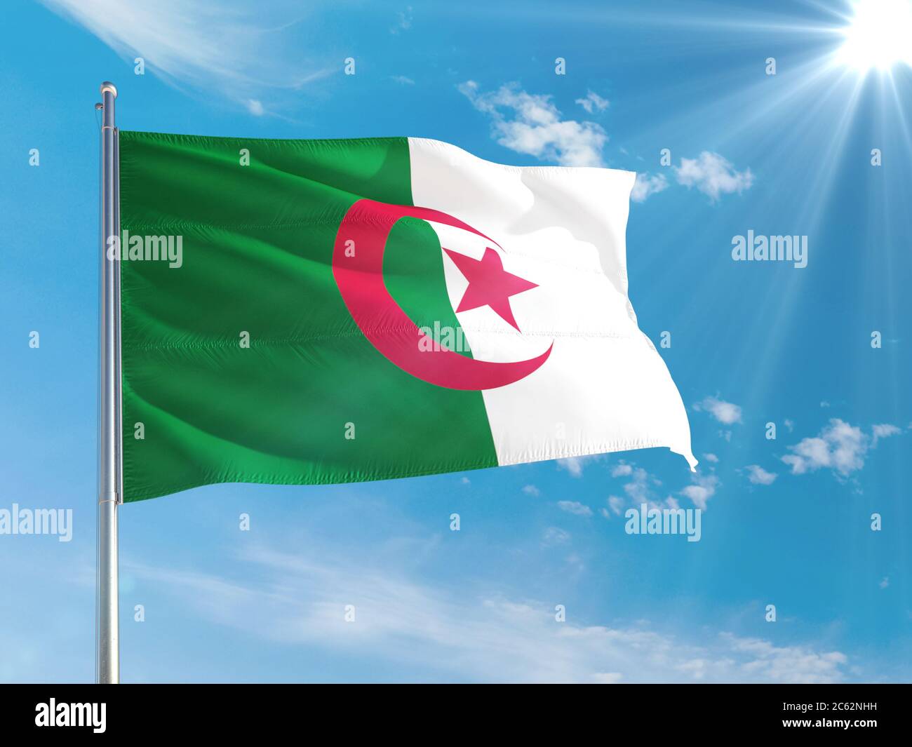 Algeria national flag waving in the wind against deep blue sky. High ...