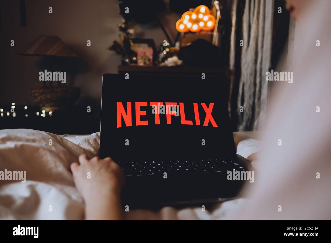 Watching netflix sofa hi-res stock photography and images - Alamy
