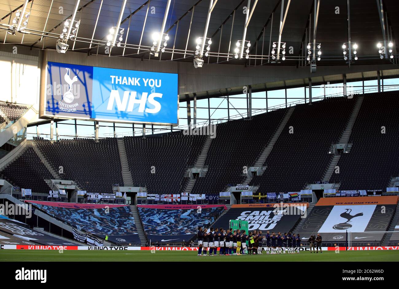 Both teams take part in an applause to thank the NHS and key workers ...