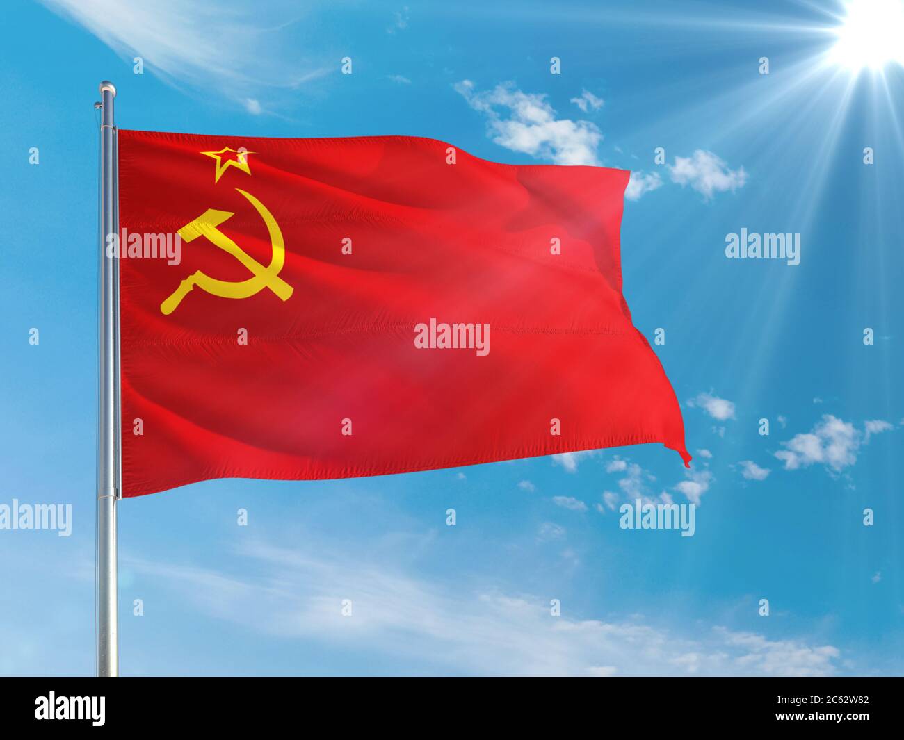 Soviet Union national flag waving in the wind against deep blue sky ...