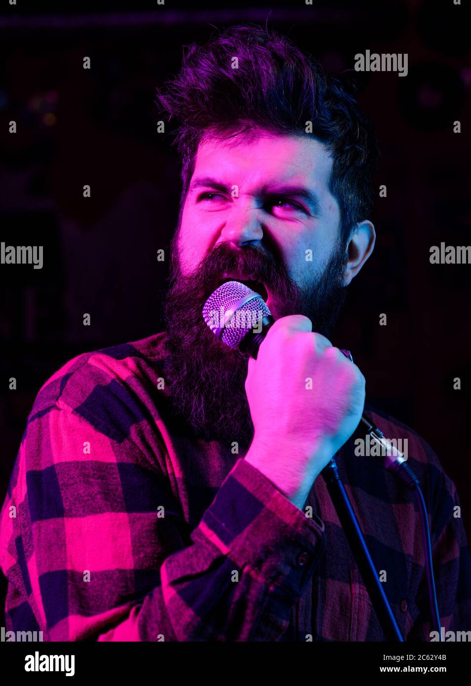 Microphone near his mouth hi-res stock photography and images - Alamy