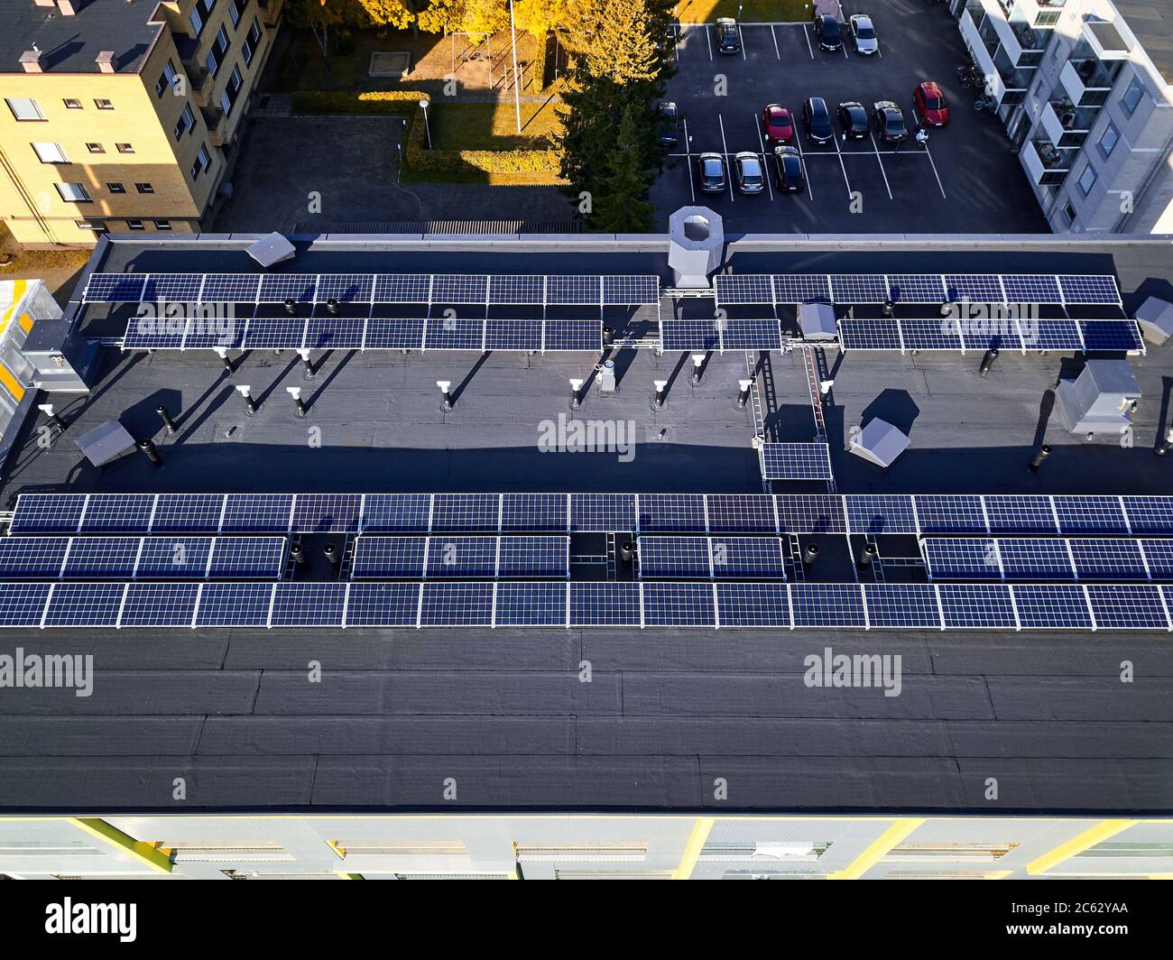 Aerial view of solar panels on the roof of the building Stock Photo - Alamy