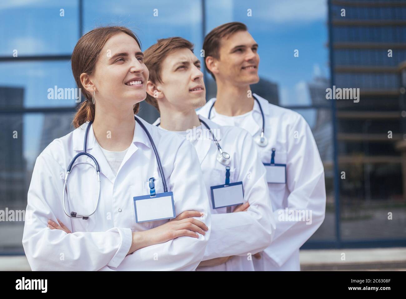 close up. group of confident medical professionals standing in a row ...
