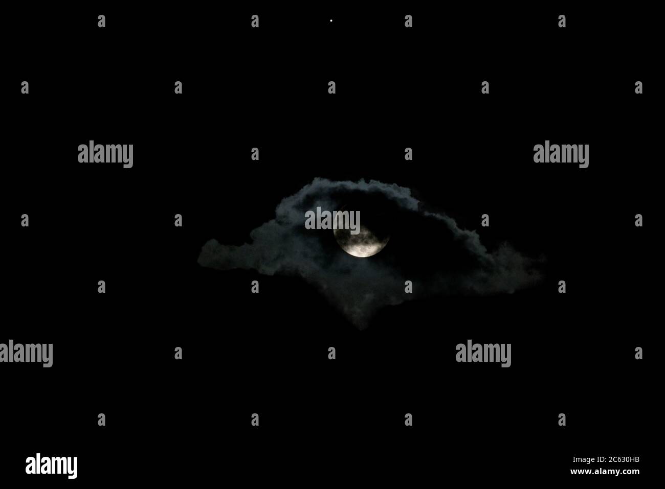moon covered with cloud and Jupiter overhead Stock Photo - Alamy