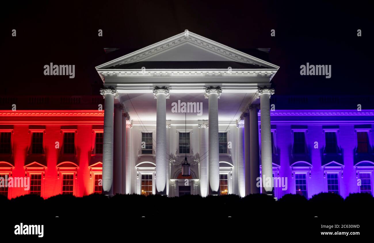 The White House North Portico lit in red-white and blue lights during ...