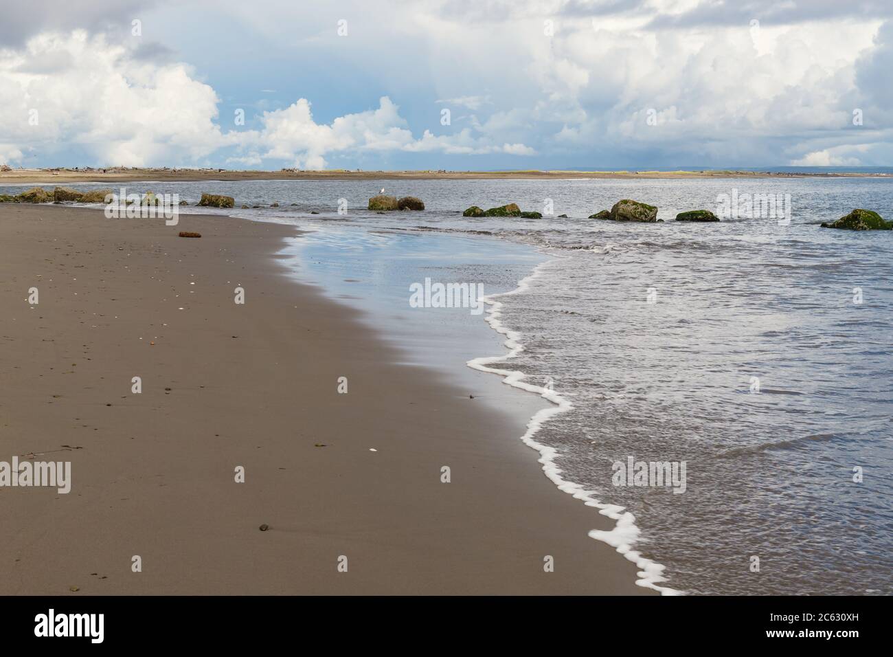 Sandy beach at the rocks hi-res stock photography and images - Alamy