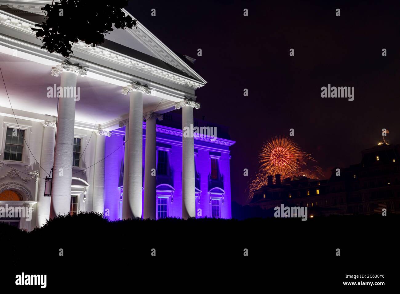 The White House North Portico lit in red-white and blue lights as ...