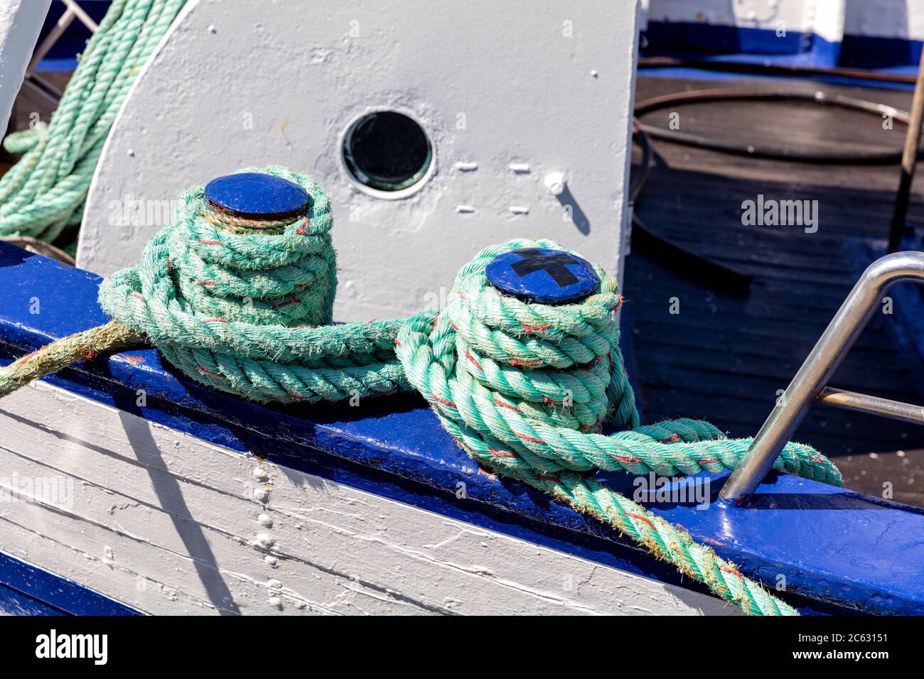 iron shipboard bitts with rope Stock Photo - Alamy