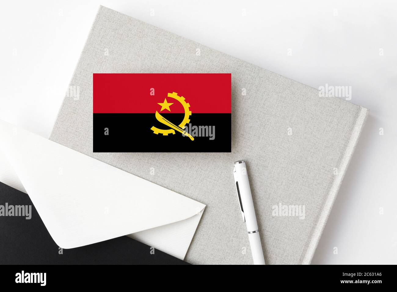 Angola flag on minimalist letter background. National invitation ...