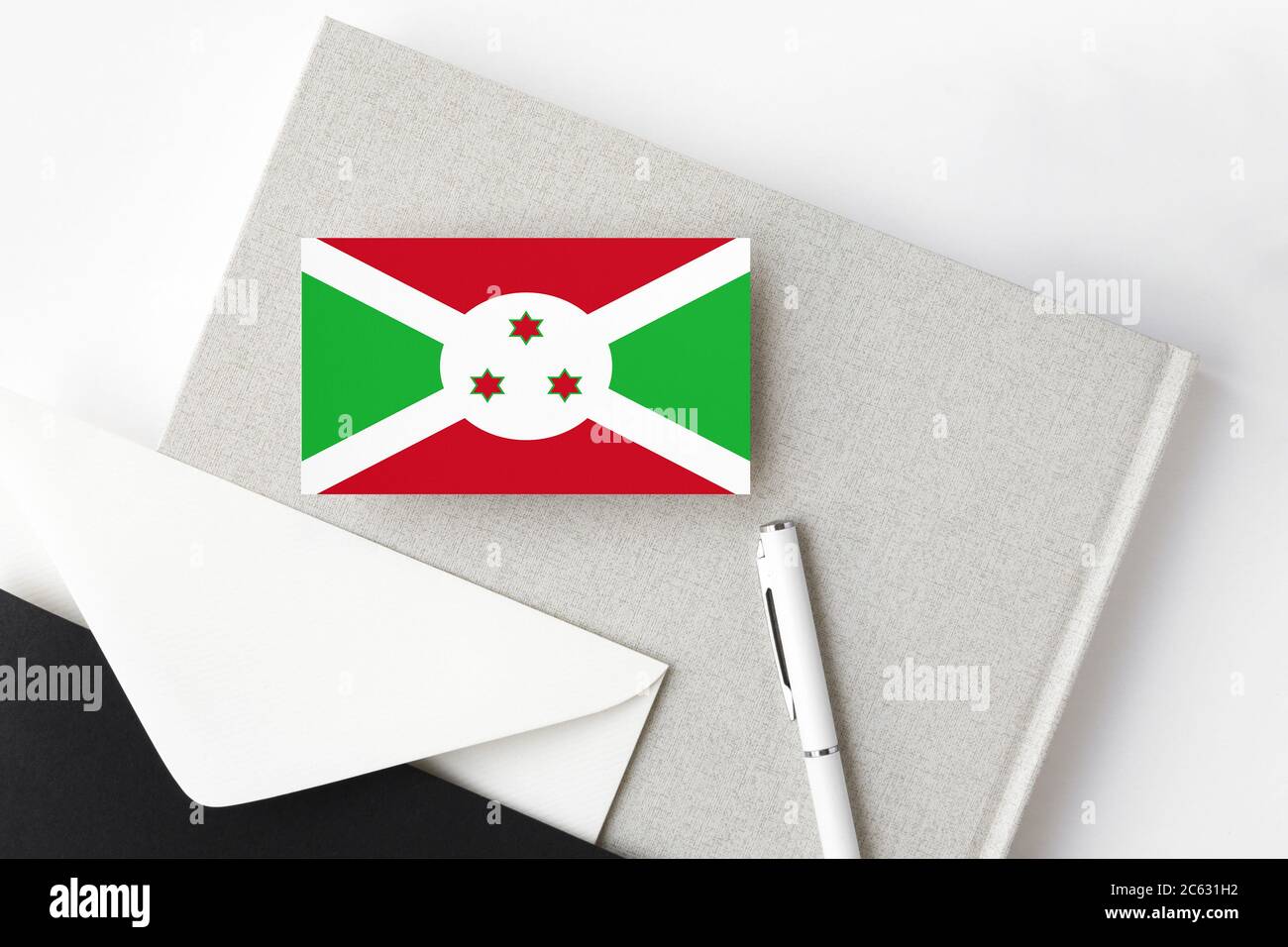 Burundi flag on minimalist letter background. National invitation ...