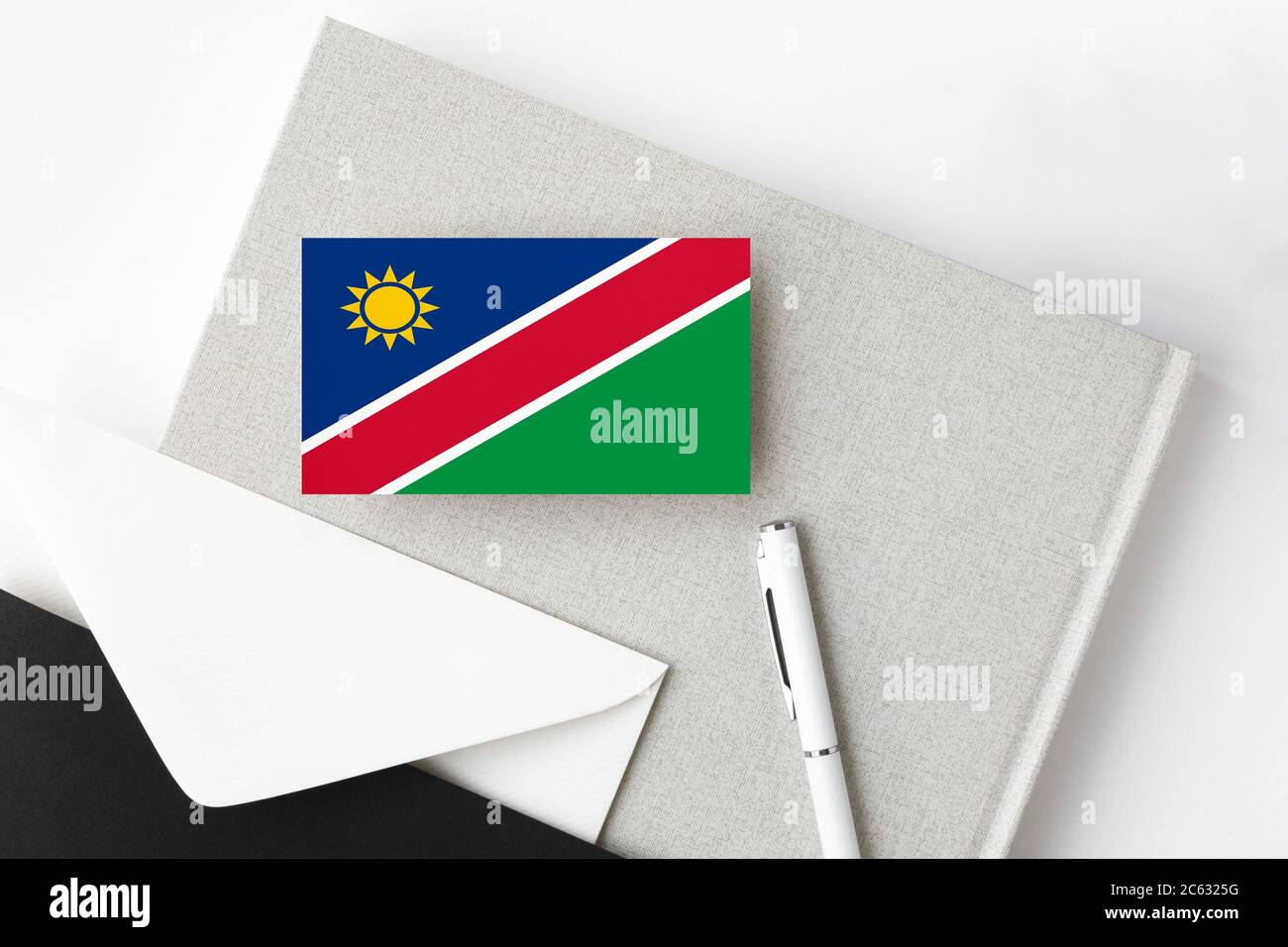 Namibia flag on minimalist letter background. National invitation ...