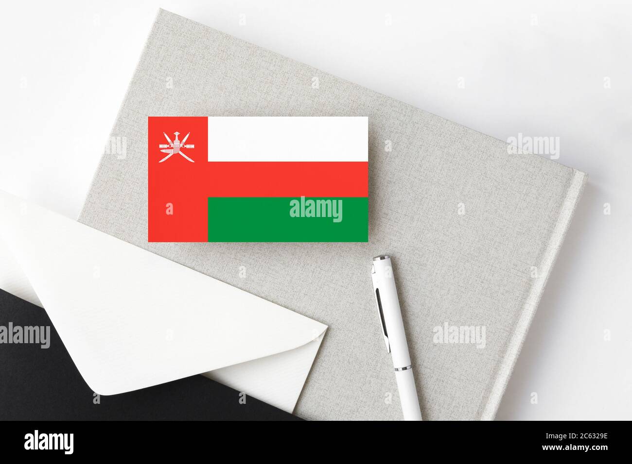 Oman flag on minimalist letter background. National invitation envelope ...