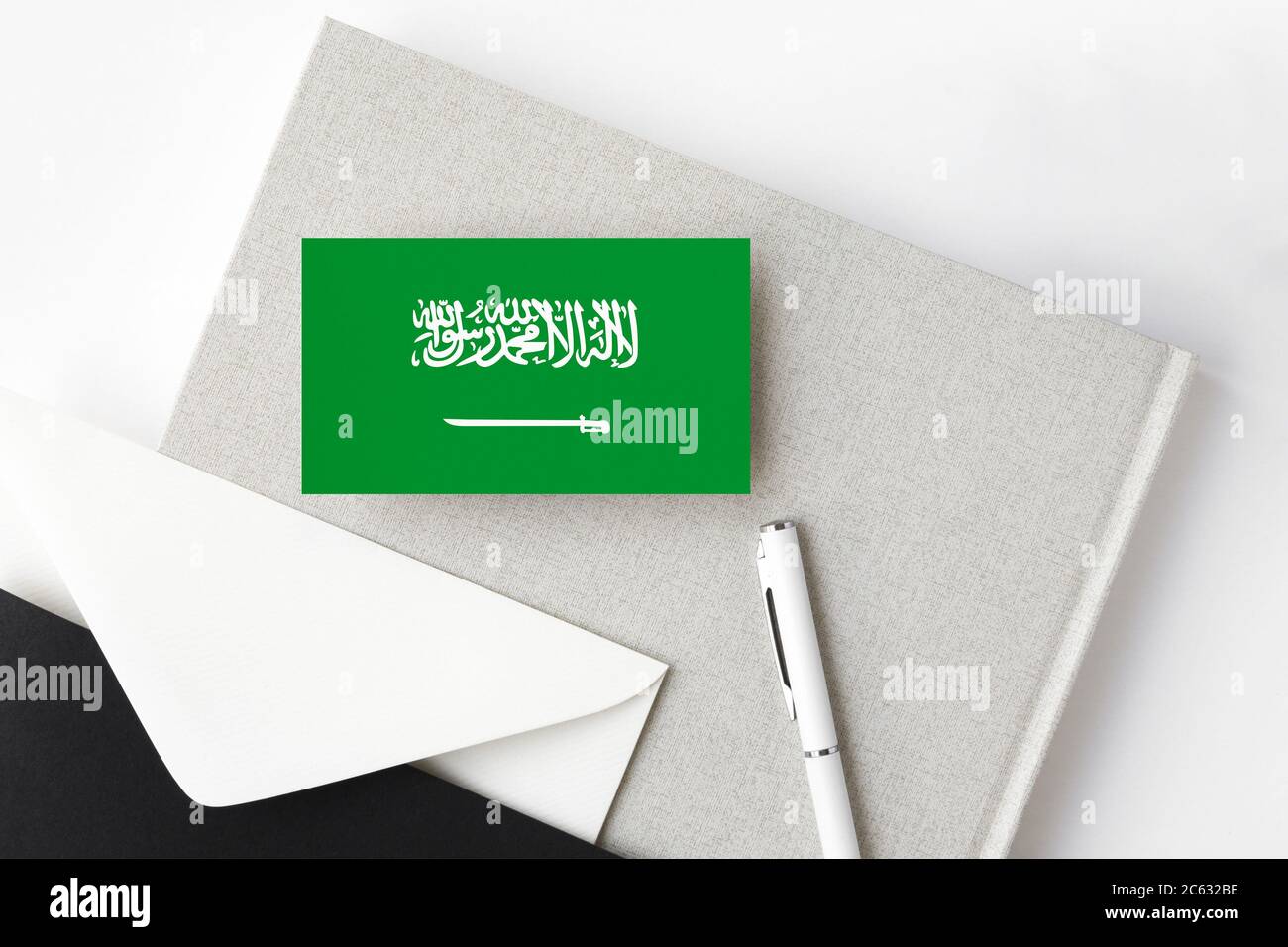 Saudi Arabia flag on minimalist letter background. National invitation ...