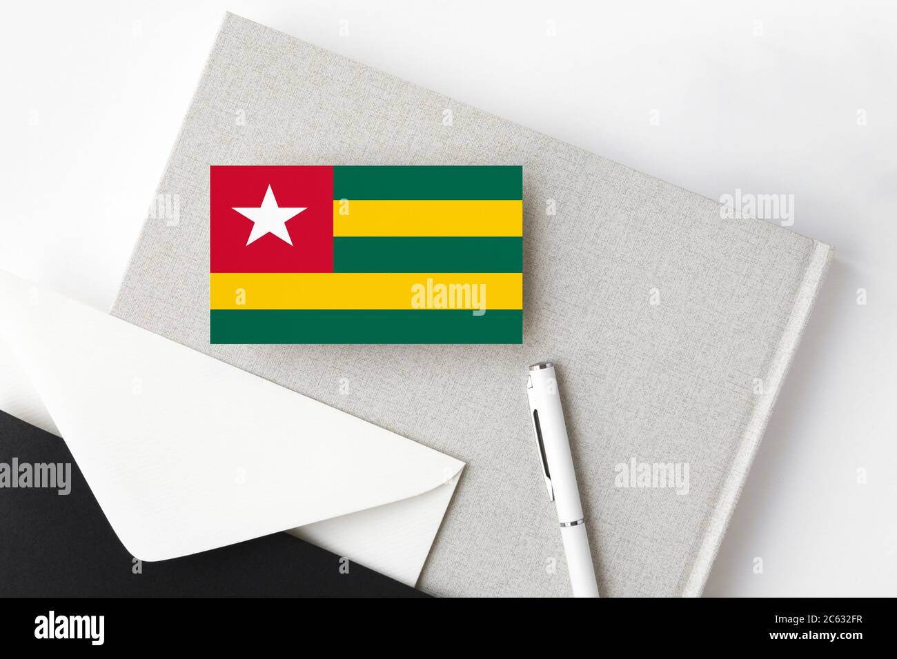 Togo flag on minimalist letter background. National invitation envelope ...