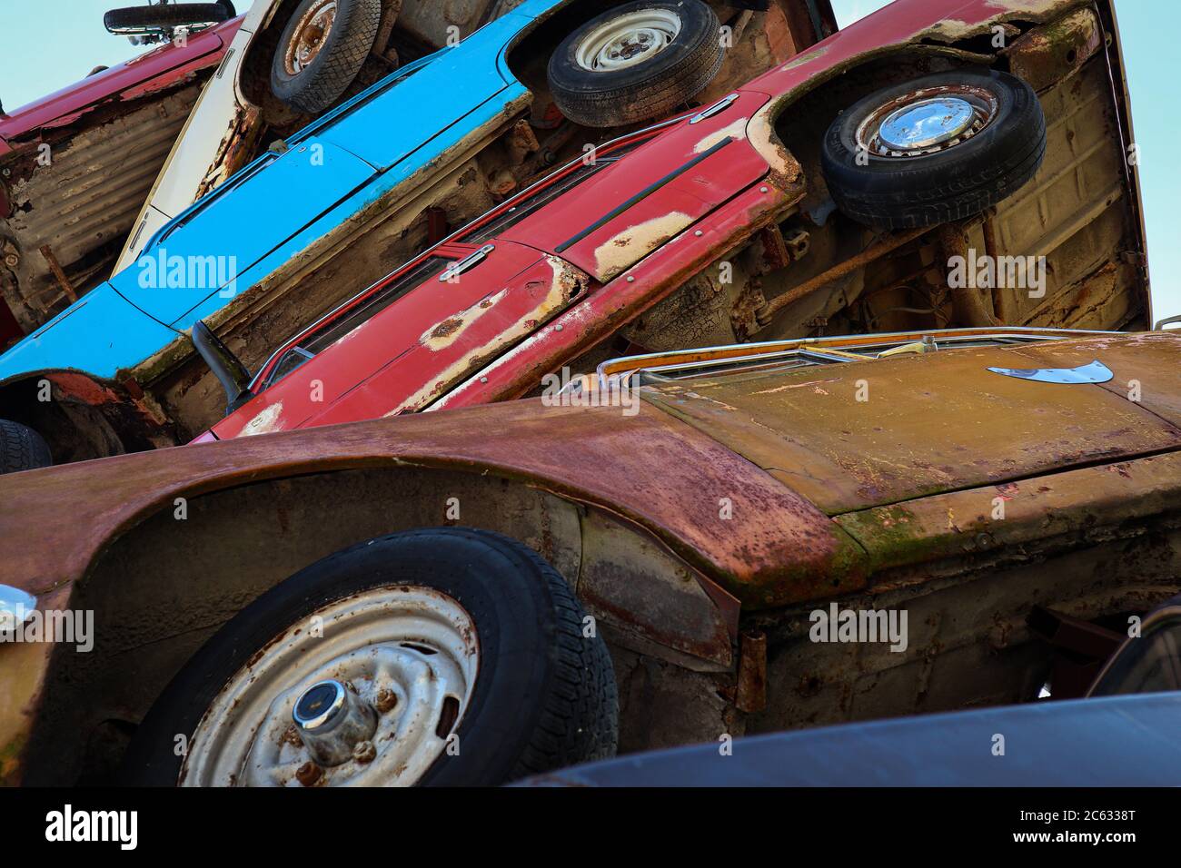 Stack of old cars, close-up bottom view Stock Photo - Alamy