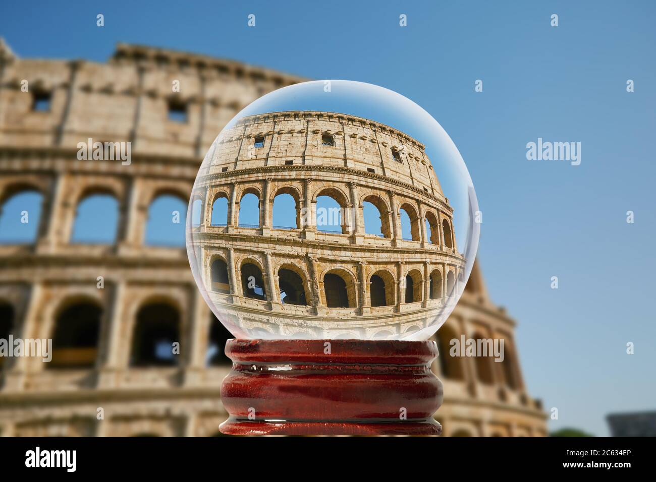 View of the Roman Coliseum through a glass transparent ball Rome, Italy ...