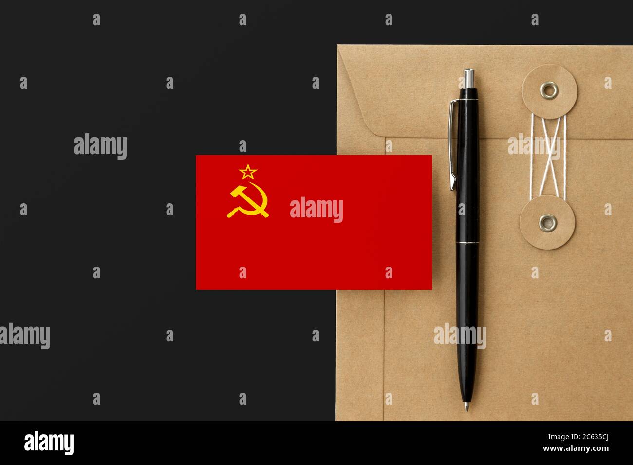 Soviet Union flag on craft envelope letter and black pen background ...